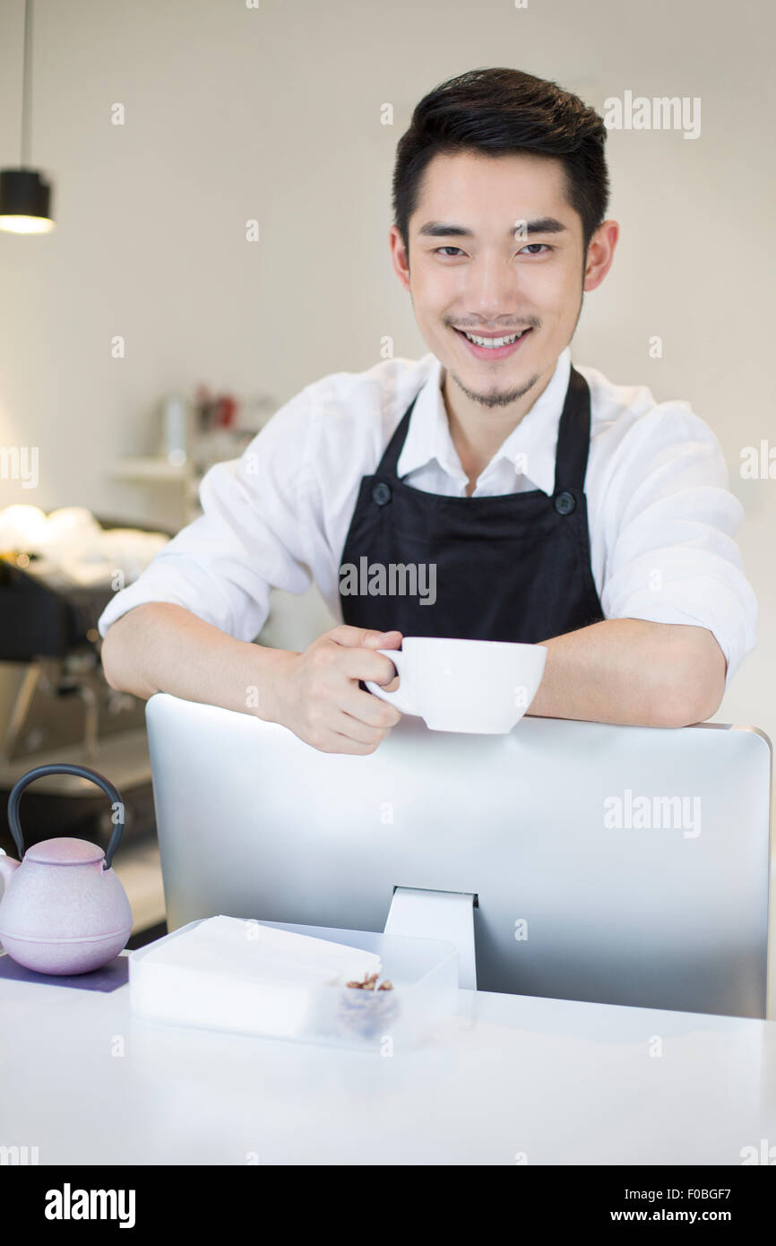 Portrait of coffee shop owner Stock Photo - Alamy