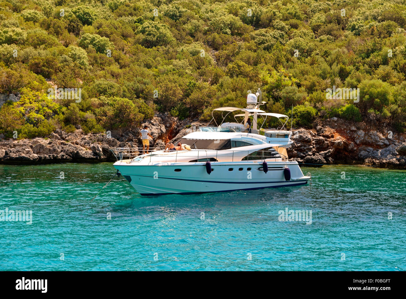 Small motor cruiser anchored in the Mediterranean Stock Photo - Alamy