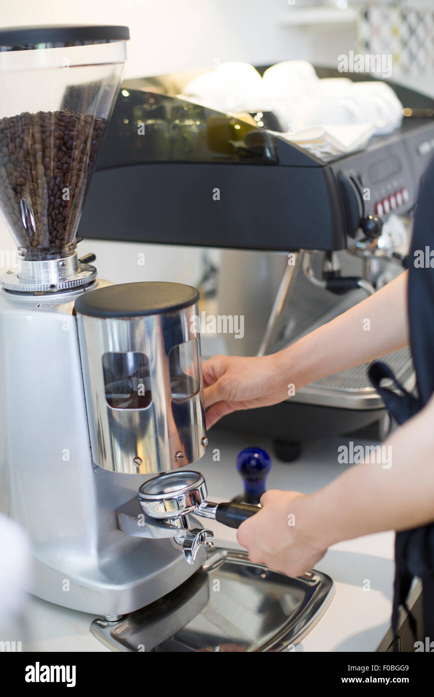 Barista making coffee Stock Photo - Alamy