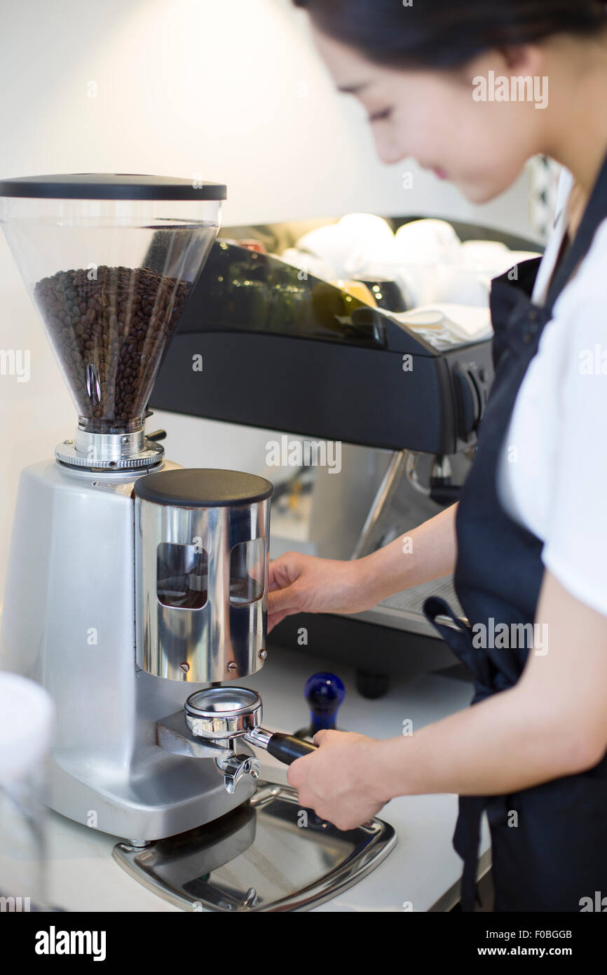 Barista making coffee Stock Photo - Alamy