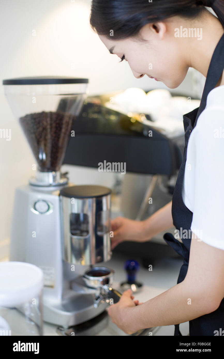 Barista making coffee Stock Photo - Alamy