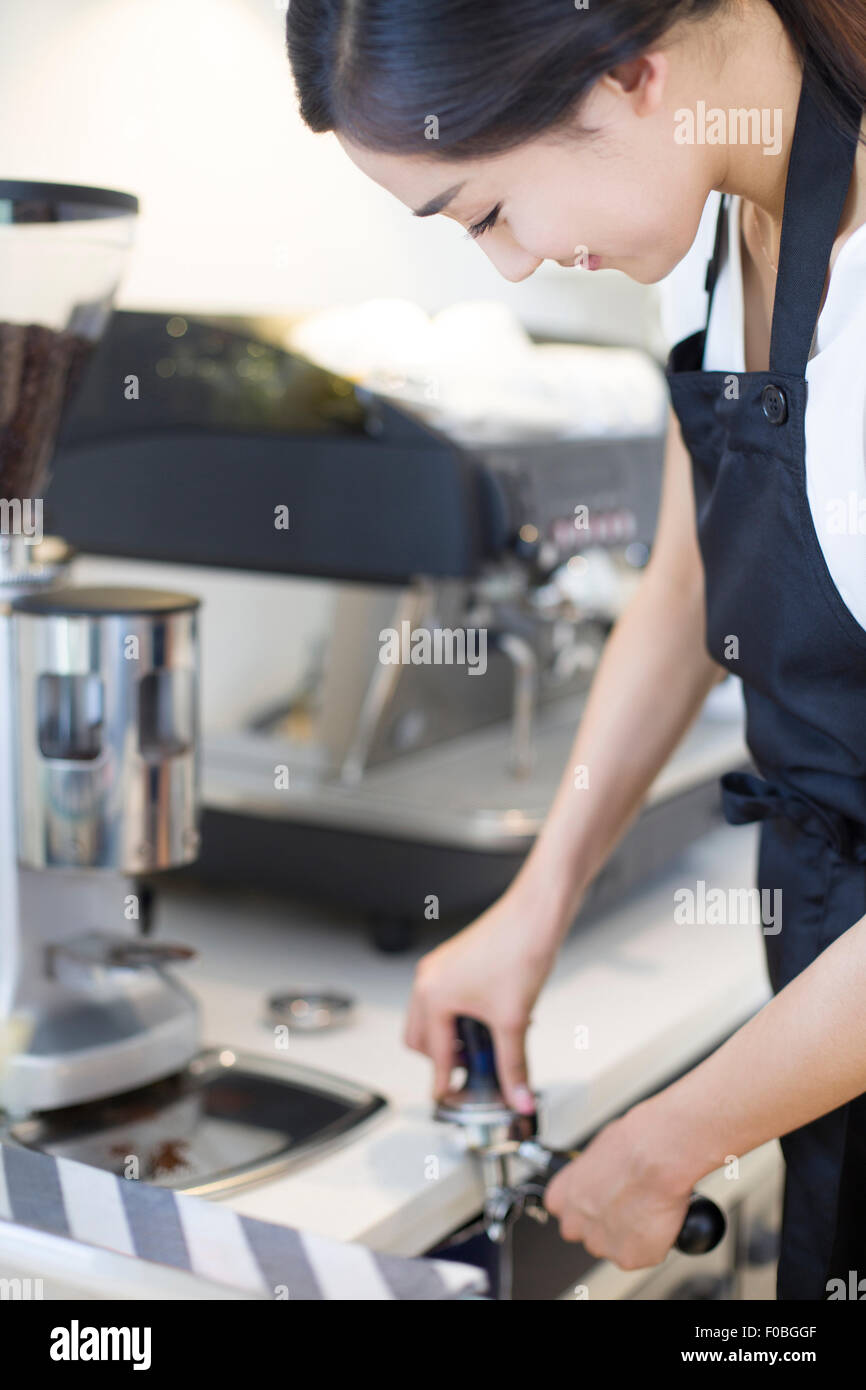 Barista making coffee Stock Photo - Alamy