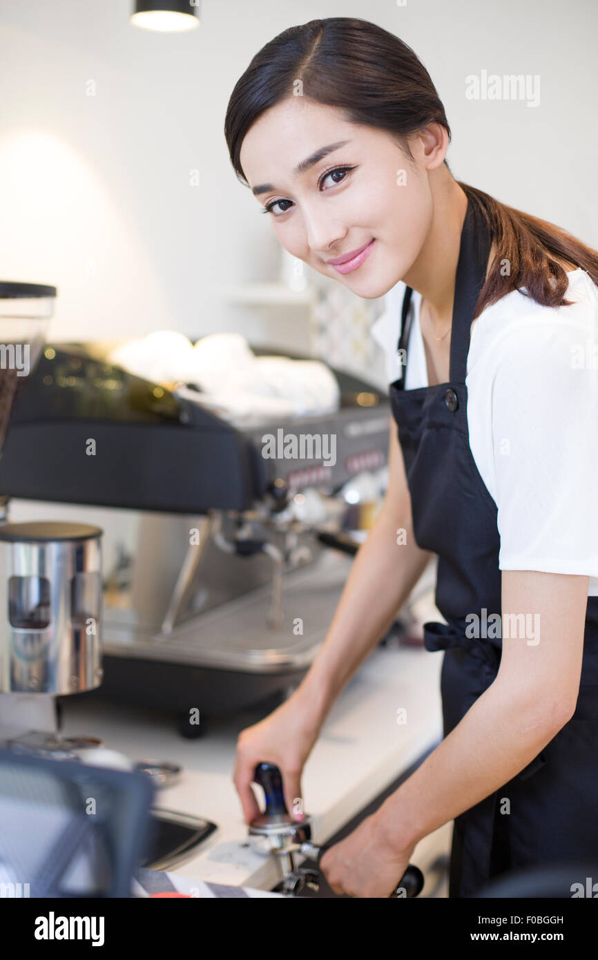 Barista making coffee Stock Photo - Alamy