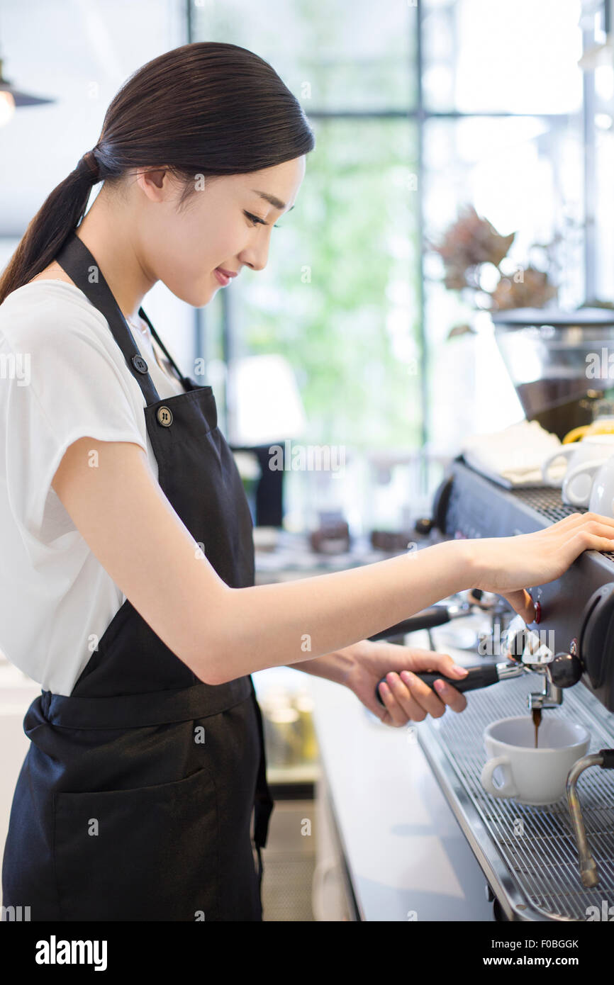 Barista making coffee Stock Photo - Alamy