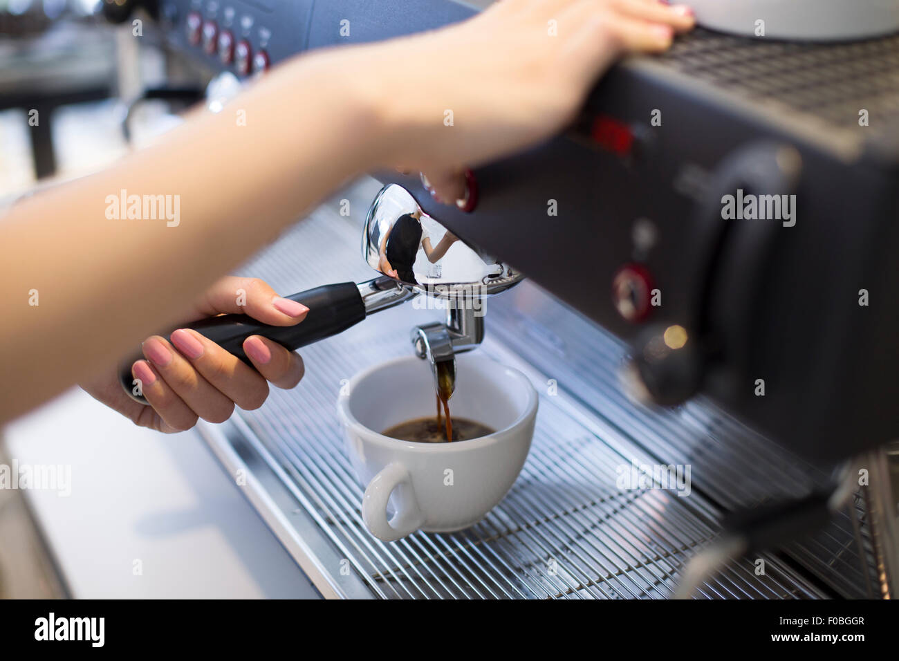 Barista making coffee Stock Photo - Alamy