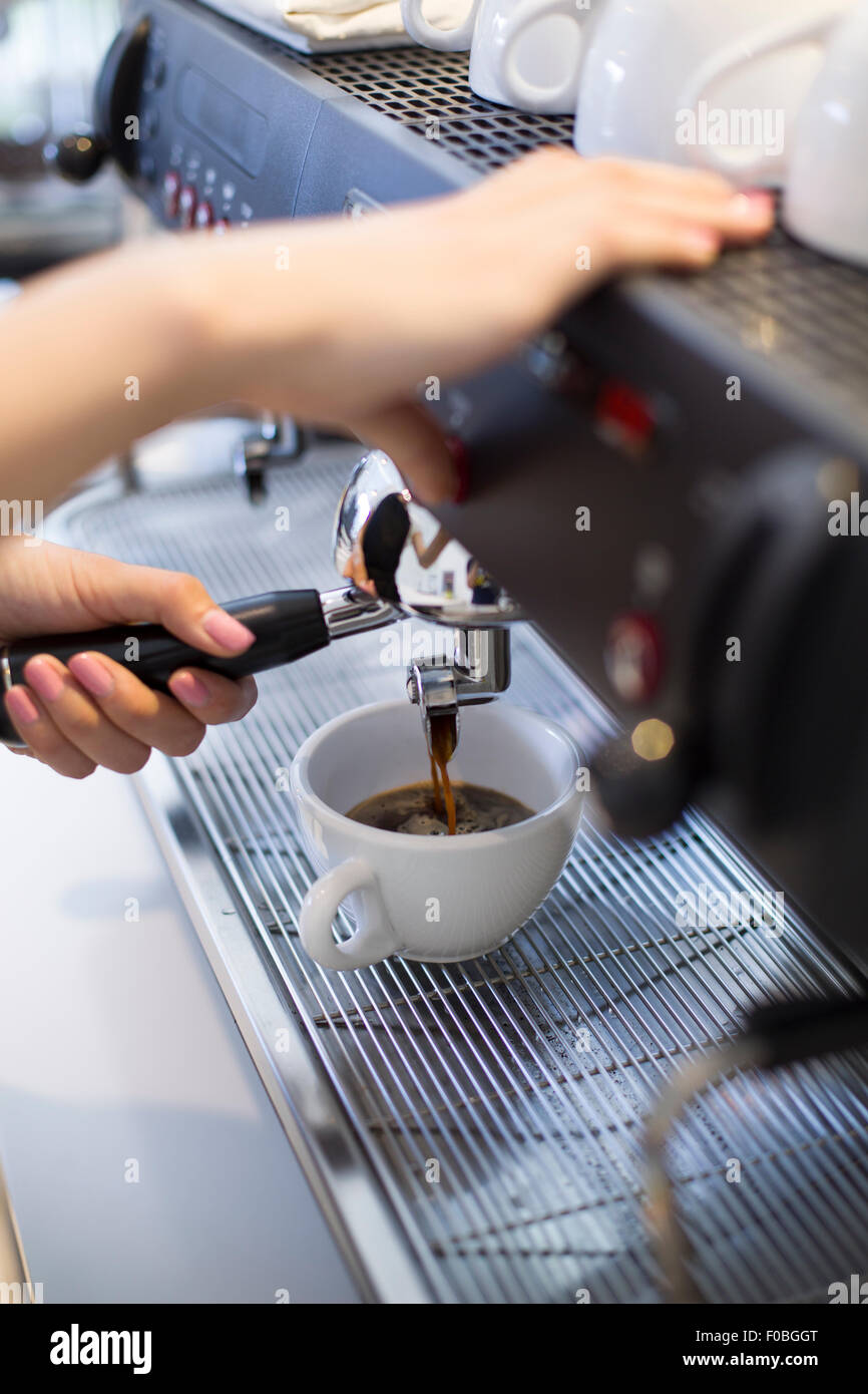Barista making coffee Stock Photo - Alamy