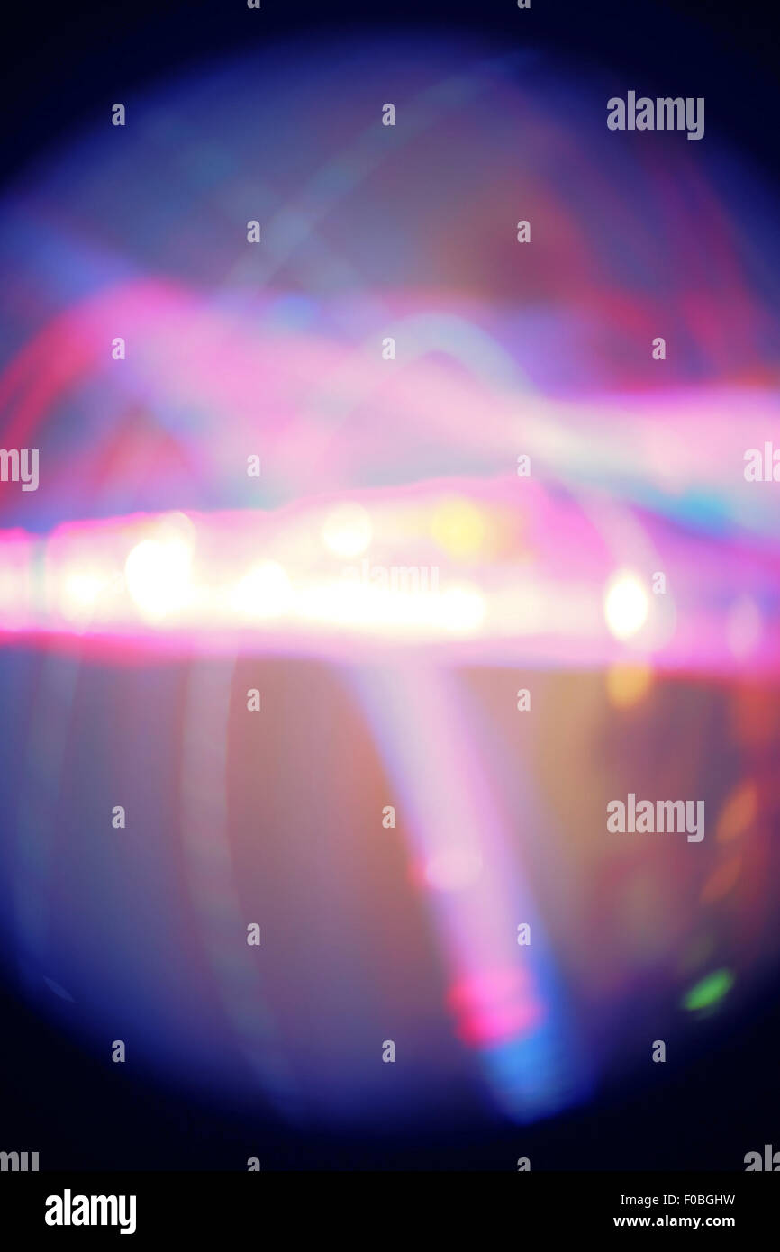 Blurred violet light trails with hard vignette Stock Photo - Alamy