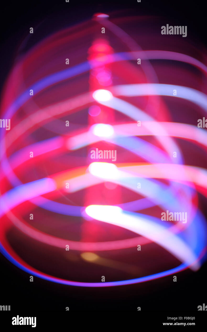 Circular light trails as background. Lightpainting art Stock Photo - Alamy