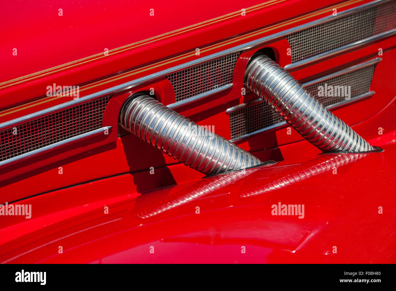 Red automobile exhaust system componen-corrugated pipe Stock Photo - Alamy