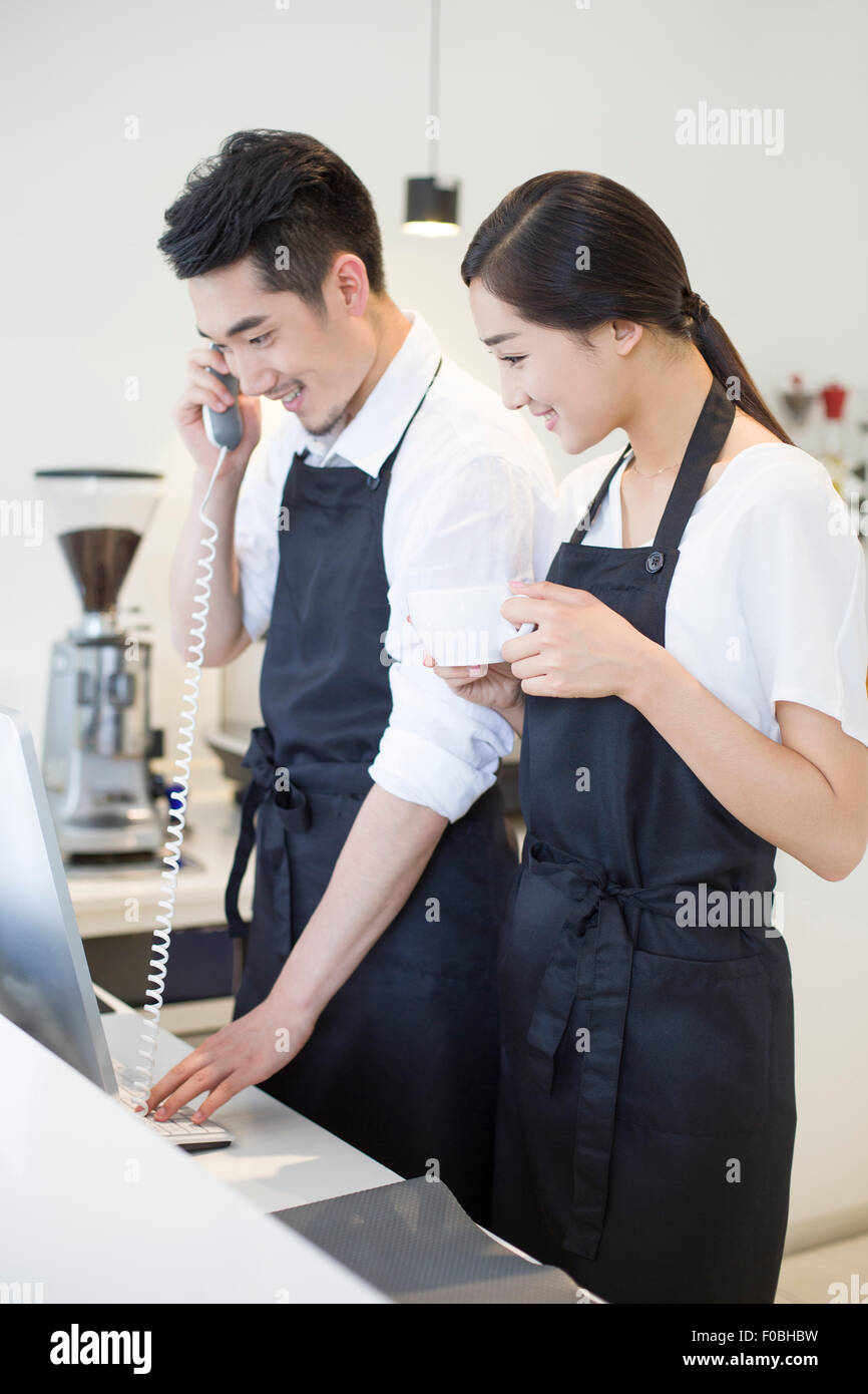 Young professional couple cafe hi-res stock photography and images - Alamy