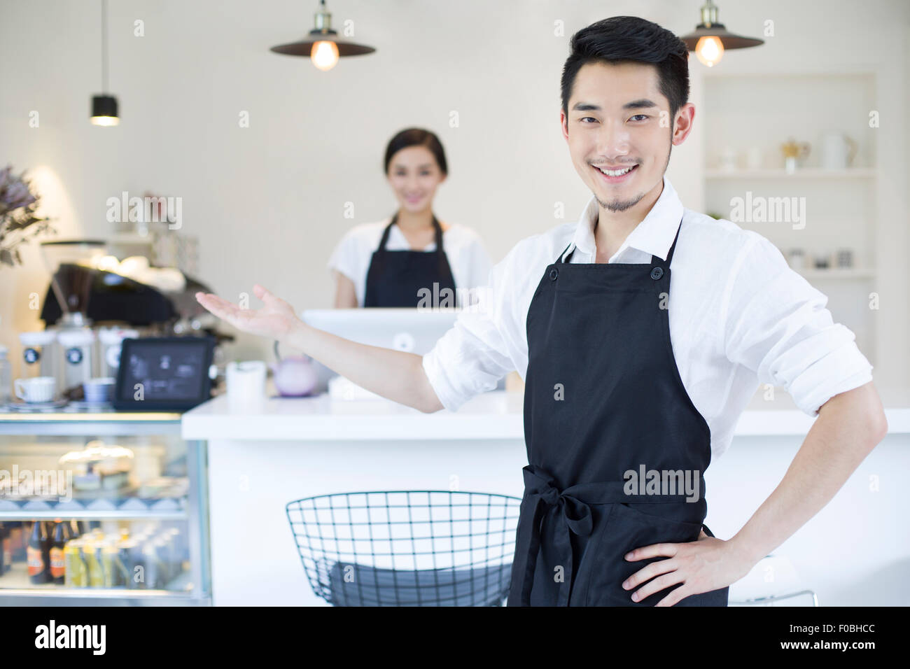 Coffee shop owner Stock Photo - Alamy