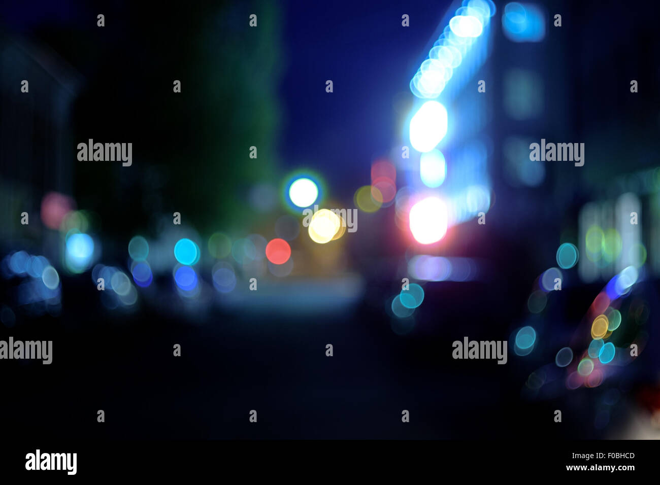 Blurred night street in blue color Stock Photo - Alamy