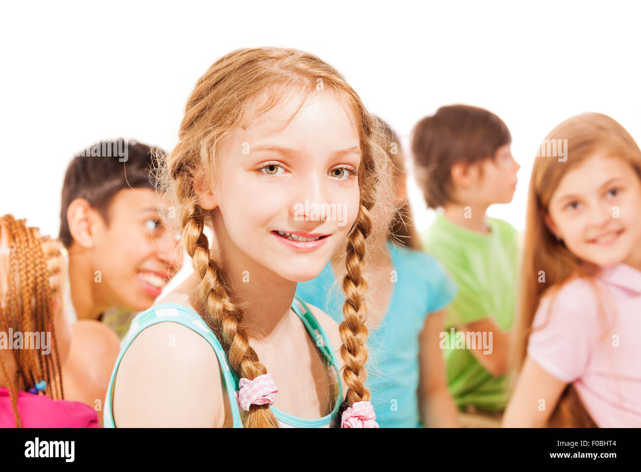 School girl with ponytails and group of friends Stock Photo - Alamy