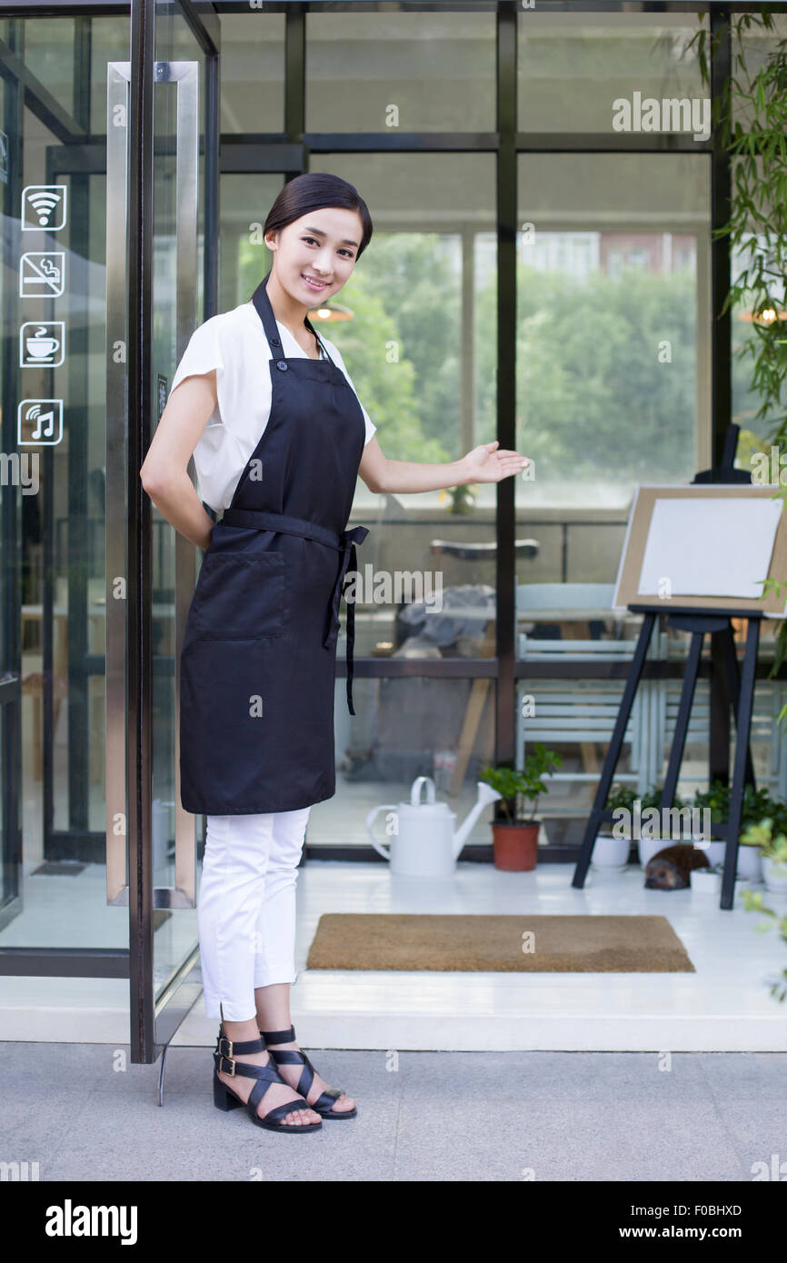 Coffee shop waitress Stock Photo - Alamy