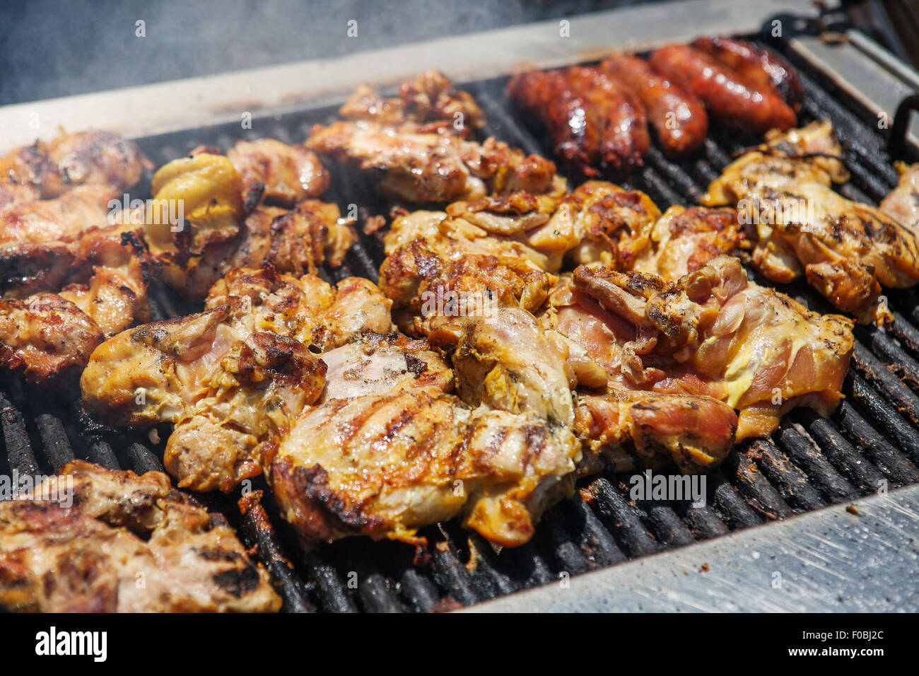 Street food grilled chicken Stock Photo - Alamy