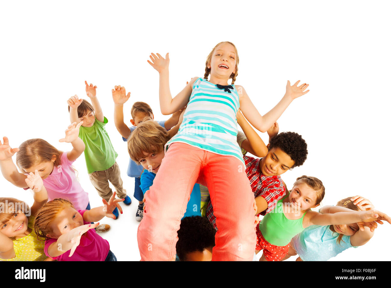 Kids carrying winner Stock Photo - Alamy