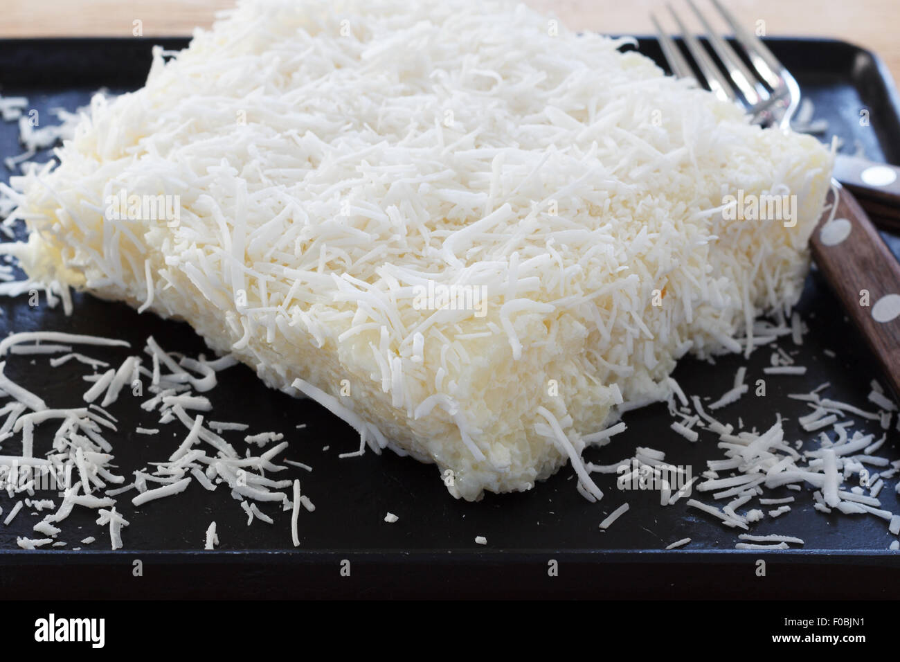 Brazilian traditional dessert: sweet couscous (tapioca) pudding (cuscuz ...