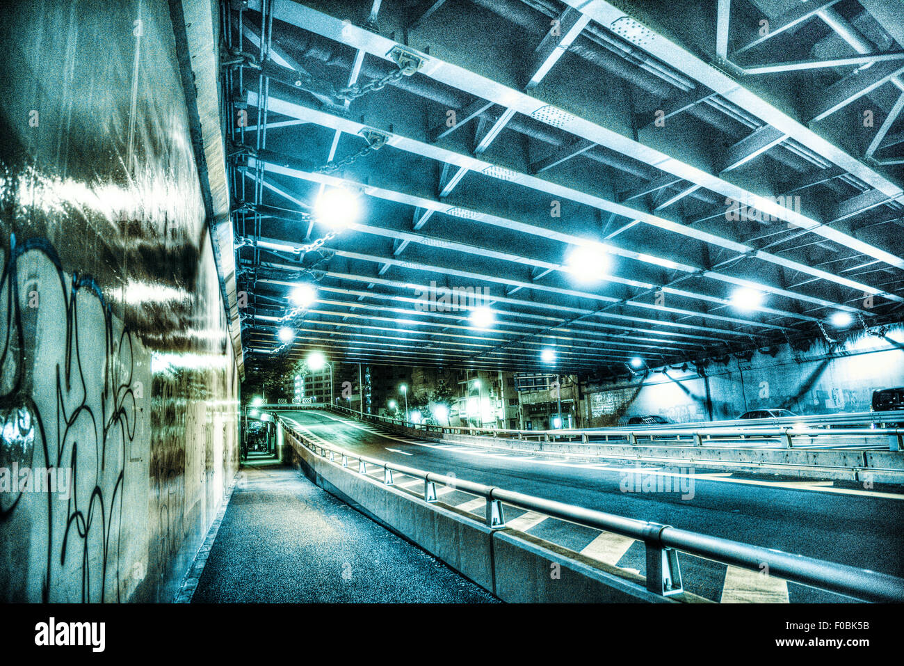 Tunnel below bridge hi-res stock photography and images - Alamy