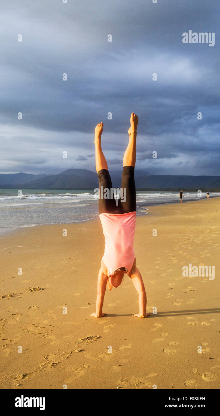 Girl doing handstand hi-res stock photography and images - Alamy