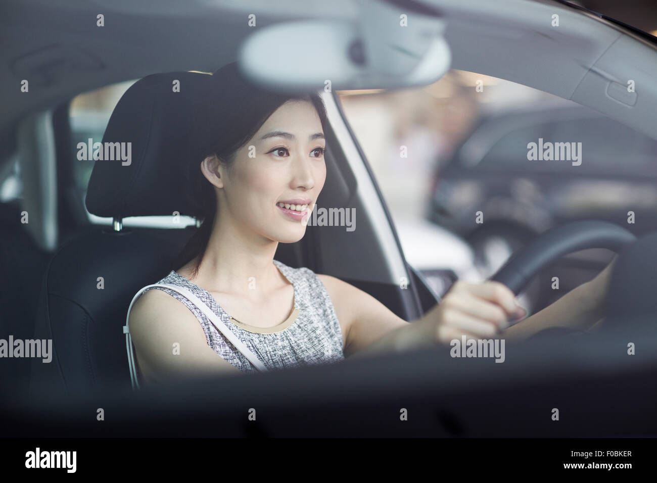 Woman drive car money hi-res stock photography and images - Alamy