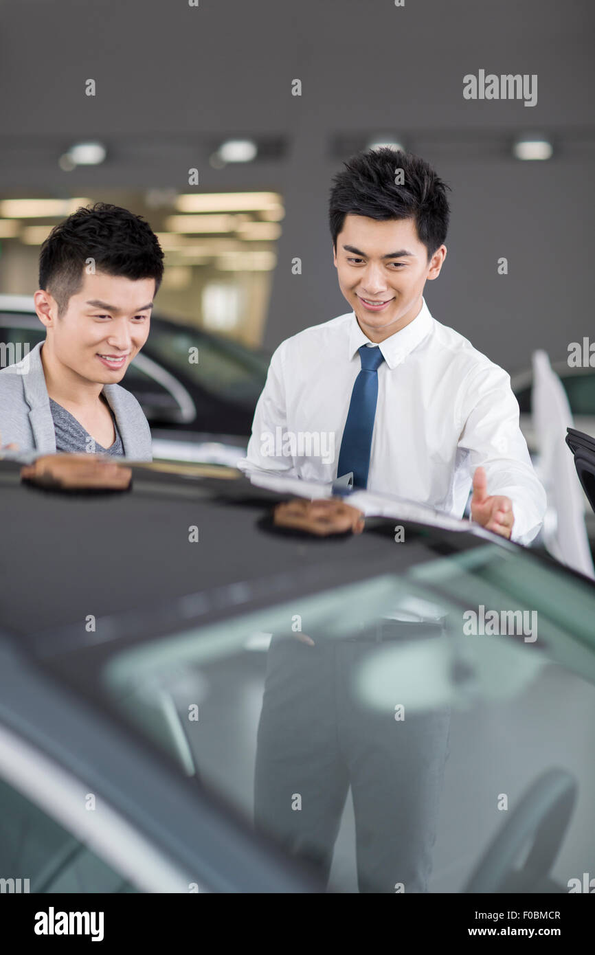 Receptionist in car dealership hi-res stock photography and images - Alamy