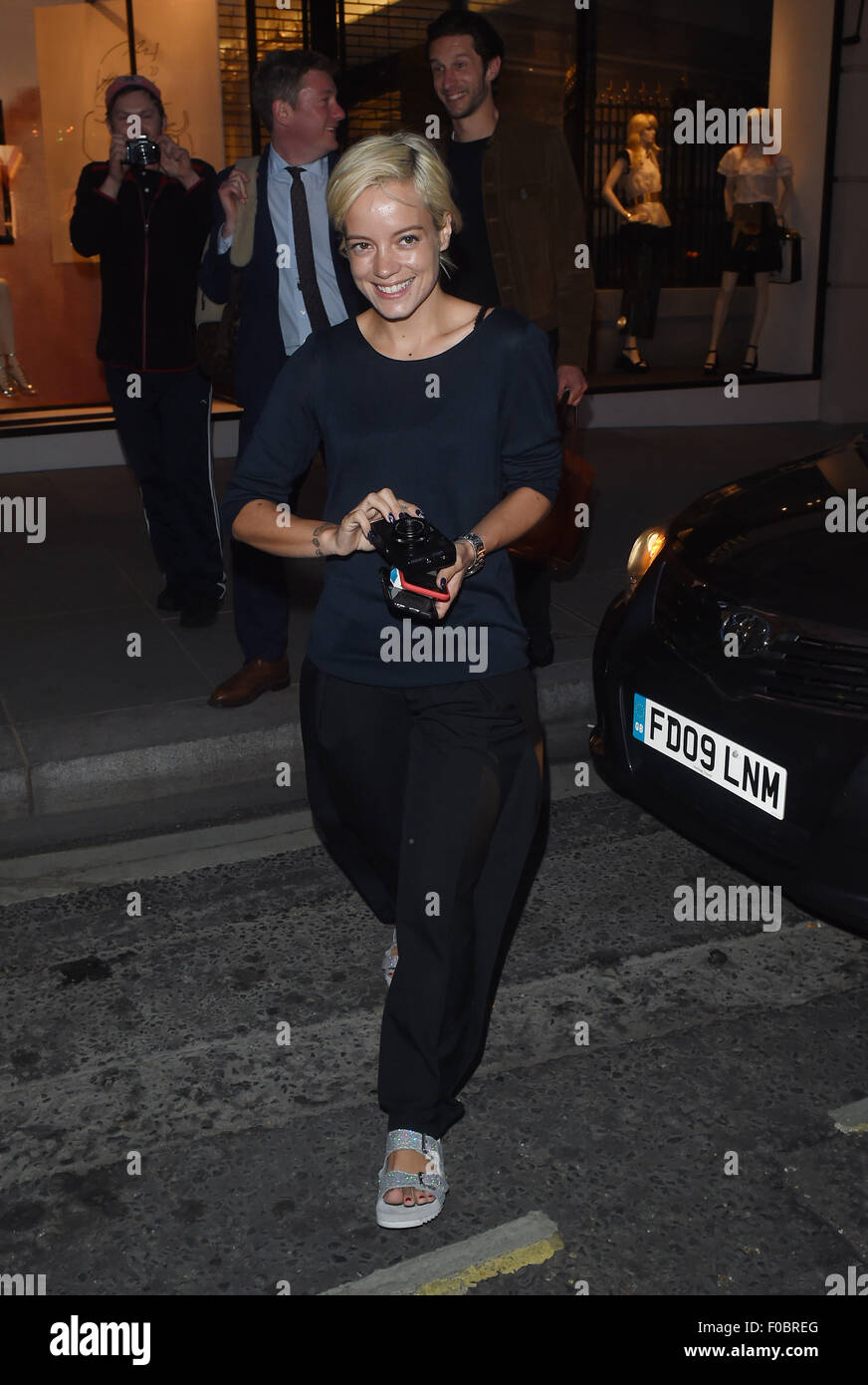 Lilly Allen is seen getting all camera happy with the paps as she is ...