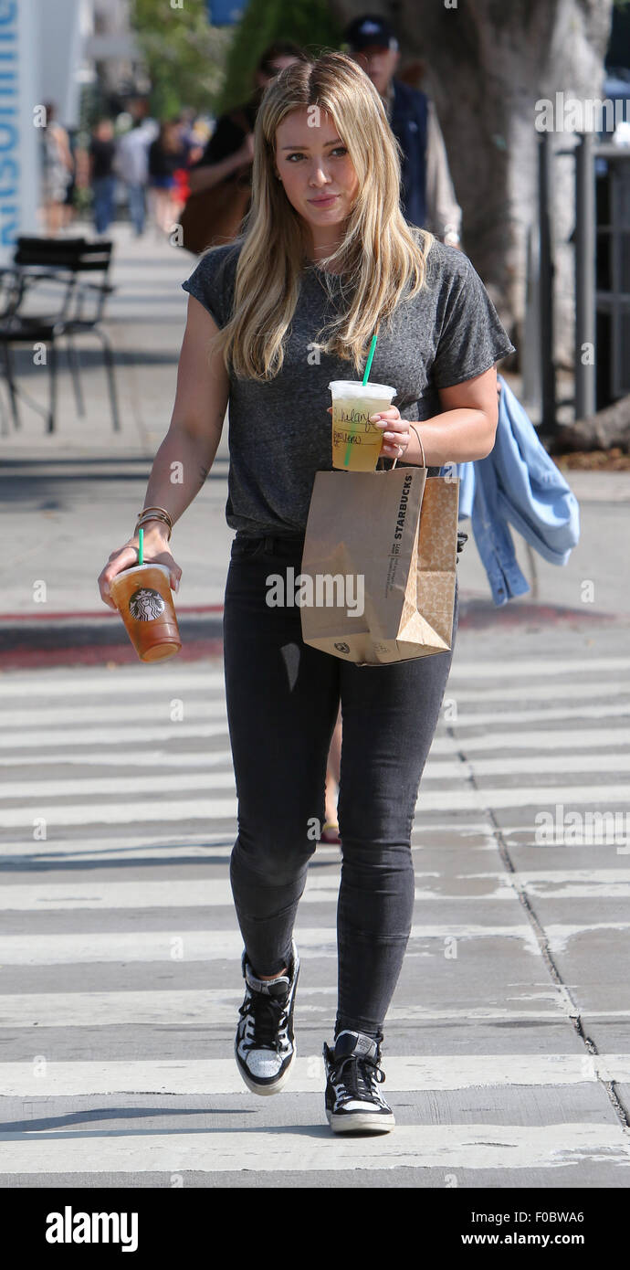 Hilary Duff picks up drinks from Starbucks in Beverly Hills Featuring ...
