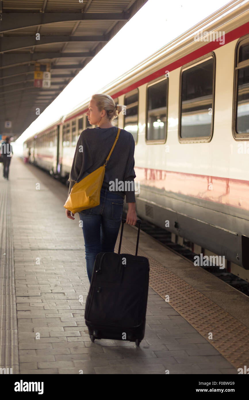 Lady traveling by train Stock Photo - Alamy