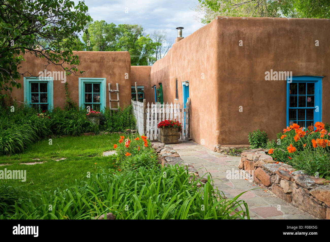 Adobe architecture with a door in Taos, New Mexico, USA Stock Photo - Alamy