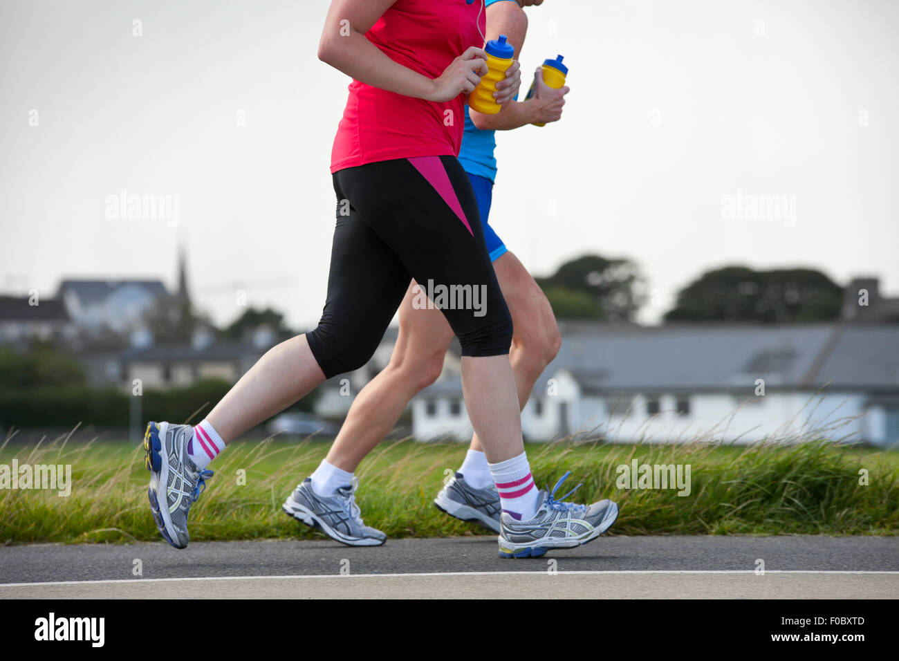 Group of runners compete in the race Stock Photo - Alamy