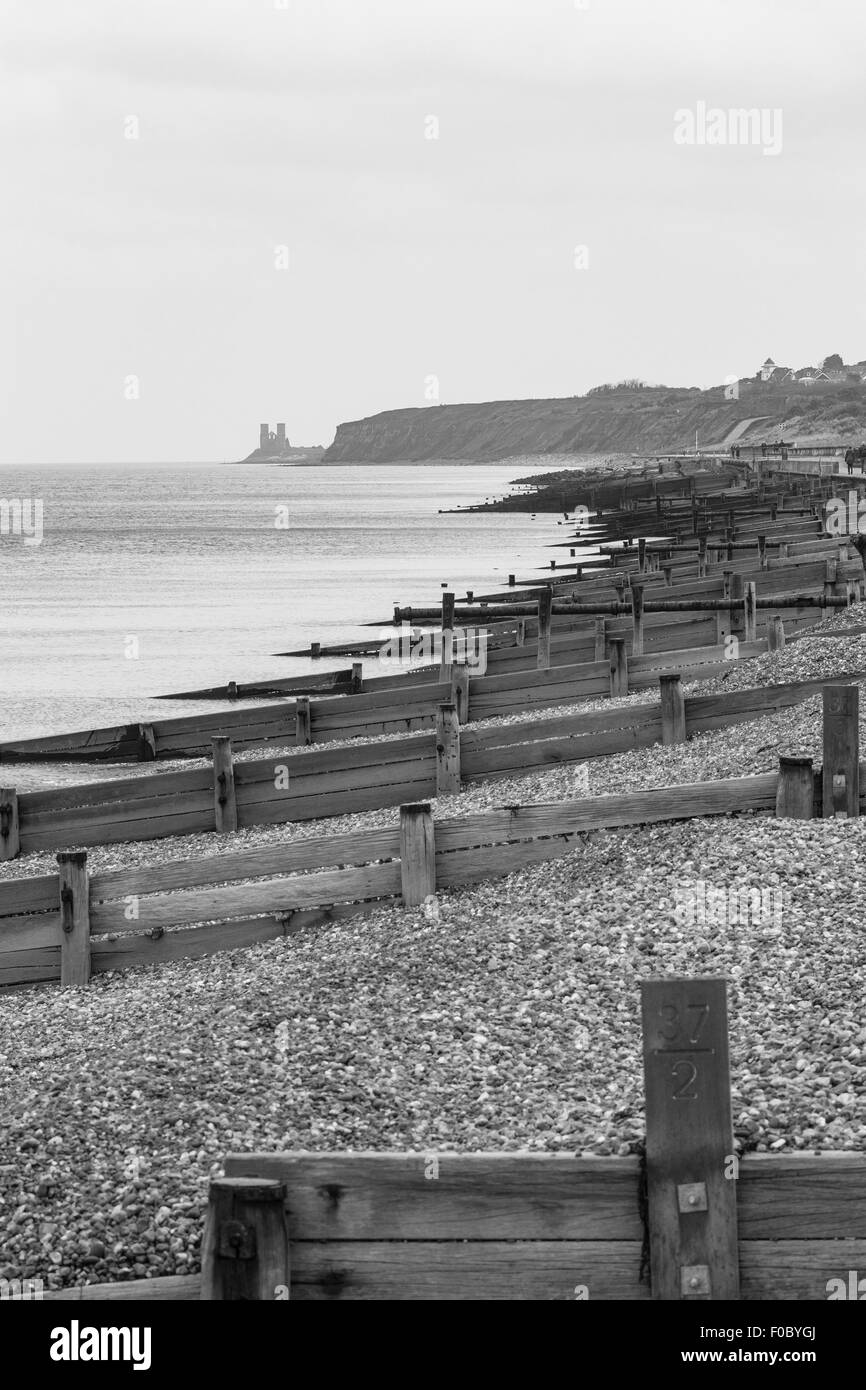 Groynes on Herne Bay Beach and Reculver Towers in the distance, Herne ...