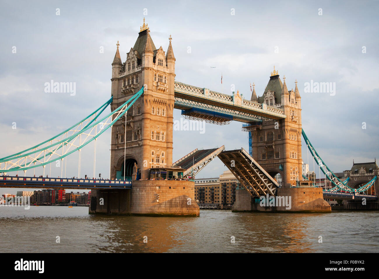 London Tower Bridge with open gates at sunset Stock Photo - Alamy