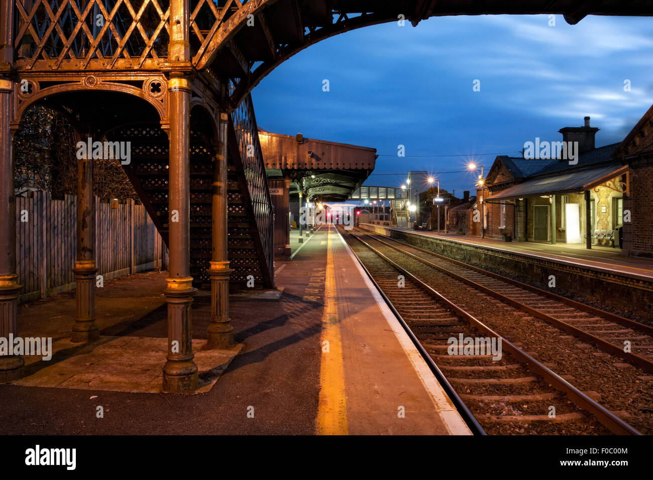 Railway Station and Old metal bridge illuminated at night, Athenry ...
