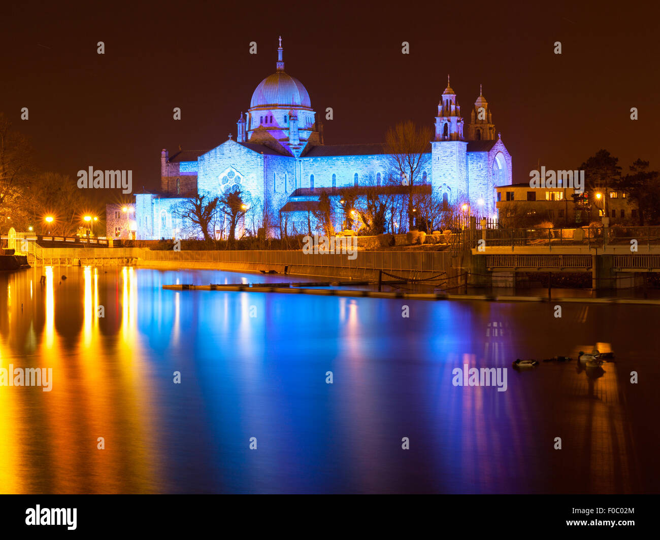 Galway Cathedral lit up blue at night Stock Photo - Alamy
