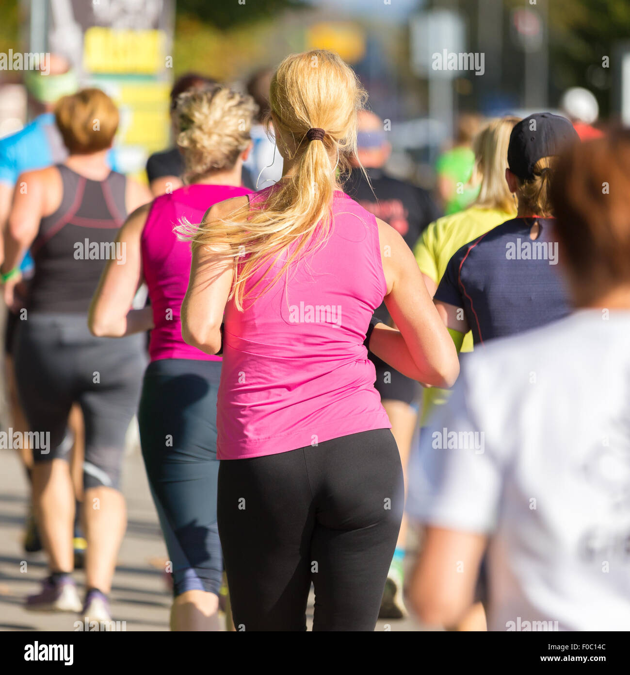Group of people running Stock Photo - Alamy