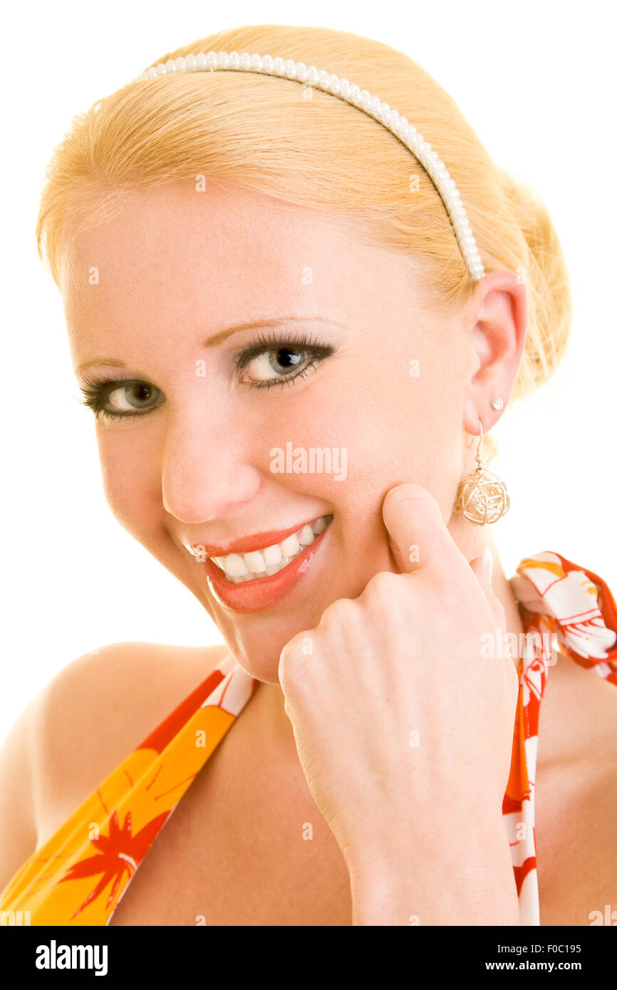 Young blonde woman smiling into the camera Stock Photo - Alamy