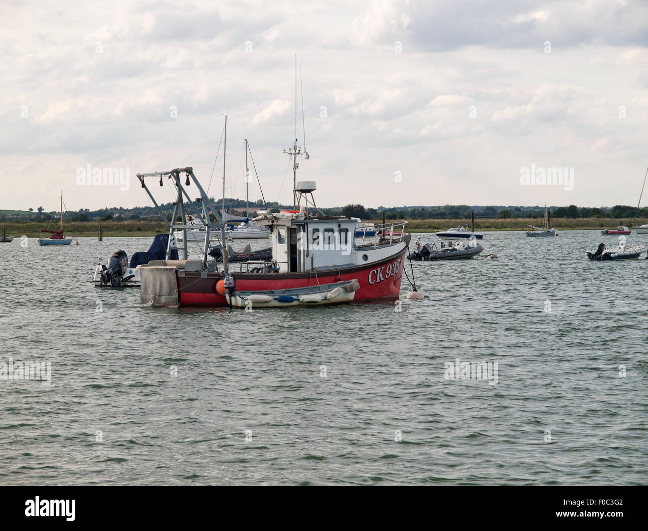 Red fishing boat moored at West Mersea. Mersea Island. Essex. England ...