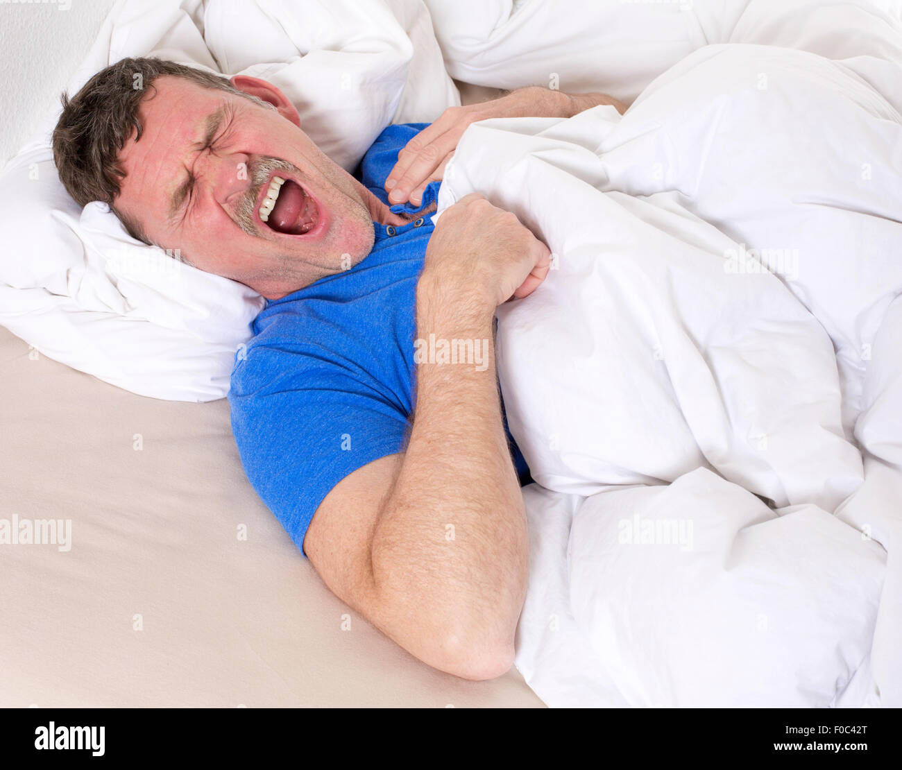 Man yawning pajamas hi-res stock photography and images - Alamy