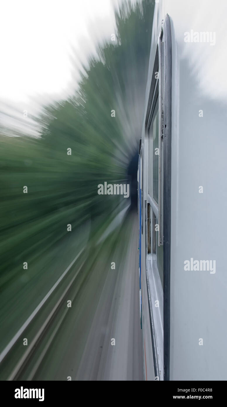 Train enters the tunnel seen from the window Stock Photo - Alamy