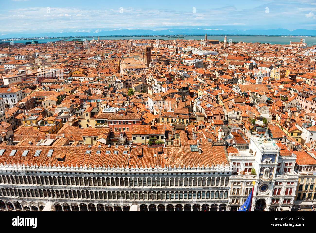 Venice roofs from above. Aerial view of houses, sea and palaces from ...