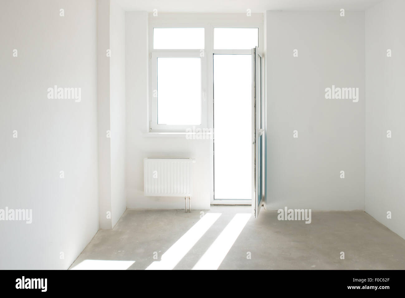 White room with window full of light Stock Photo - Alamy