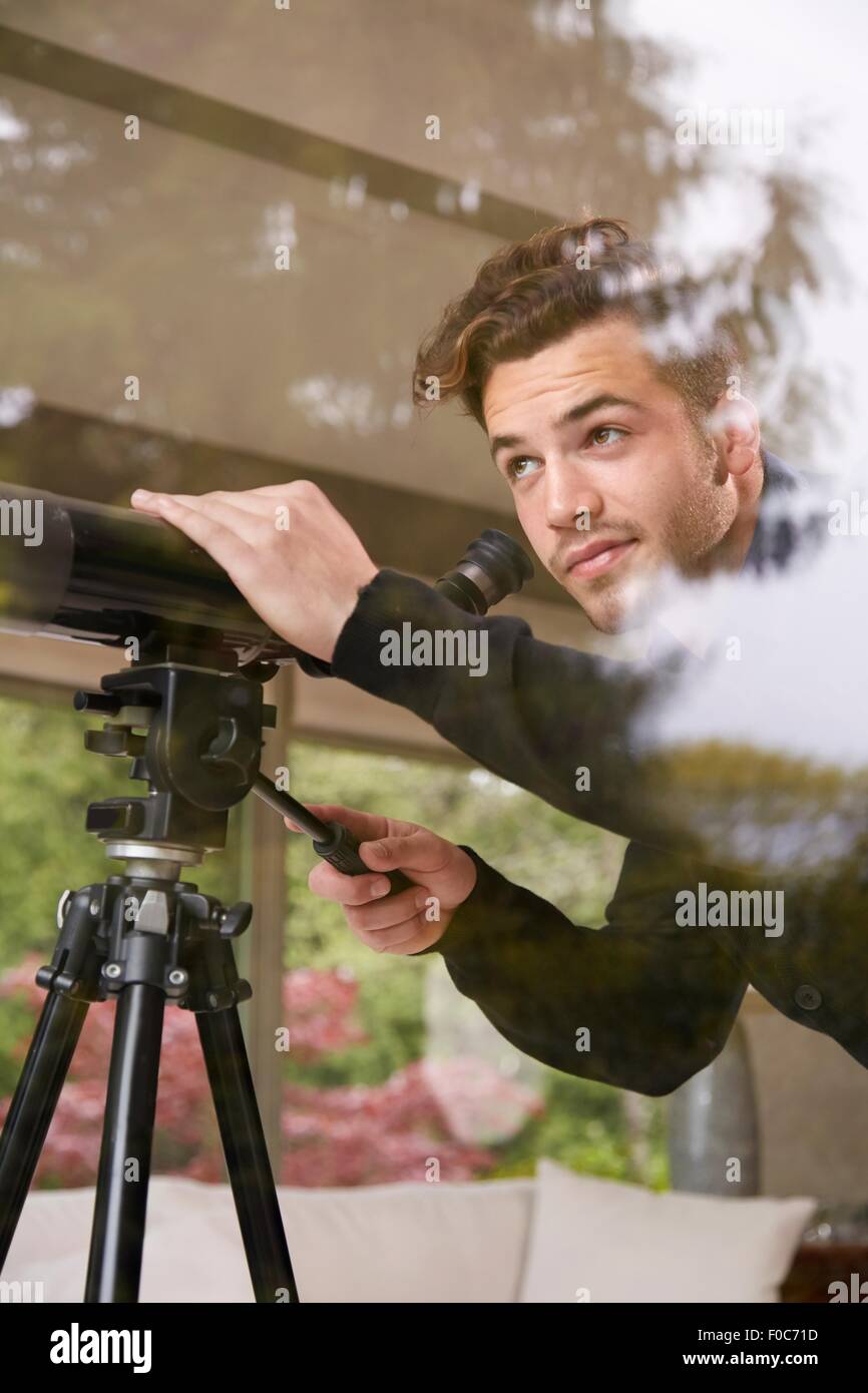 Holding telescope hi-res stock photography and images - Alamy
