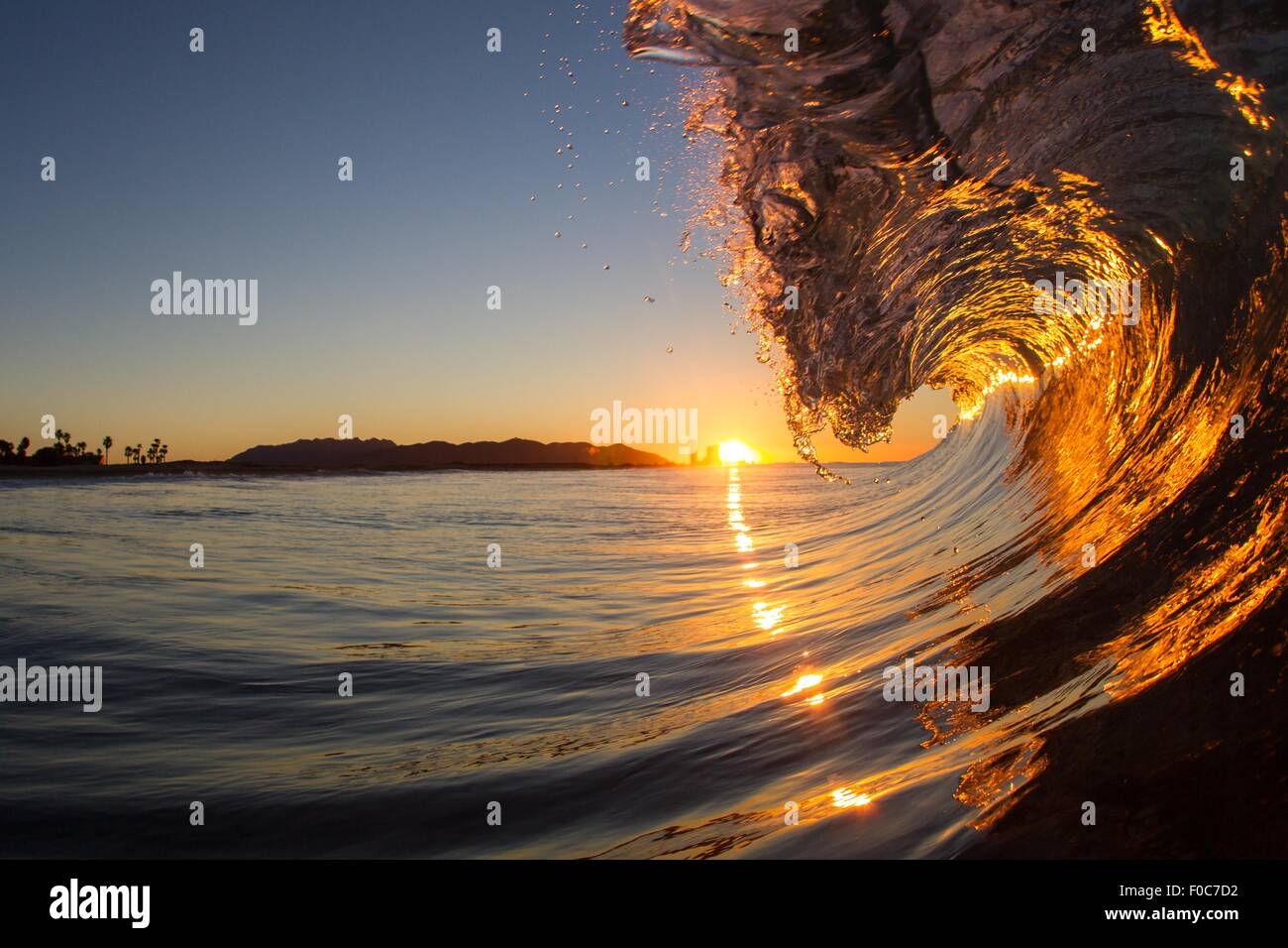 Hawaii wave sunset hi-res stock photography and images - Alamy