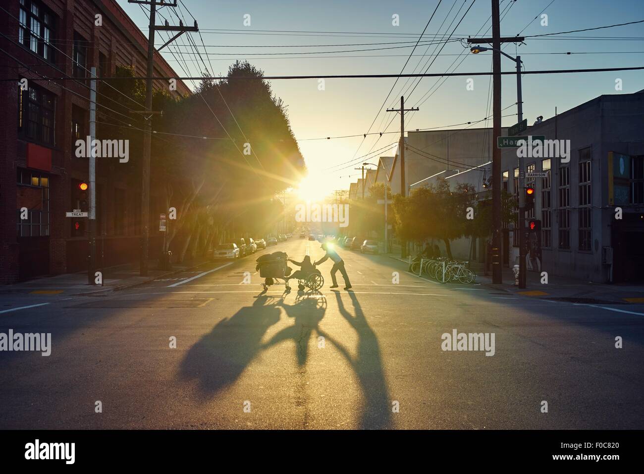 People crossing road at sunset, San Francisco, California, USA Stock ...