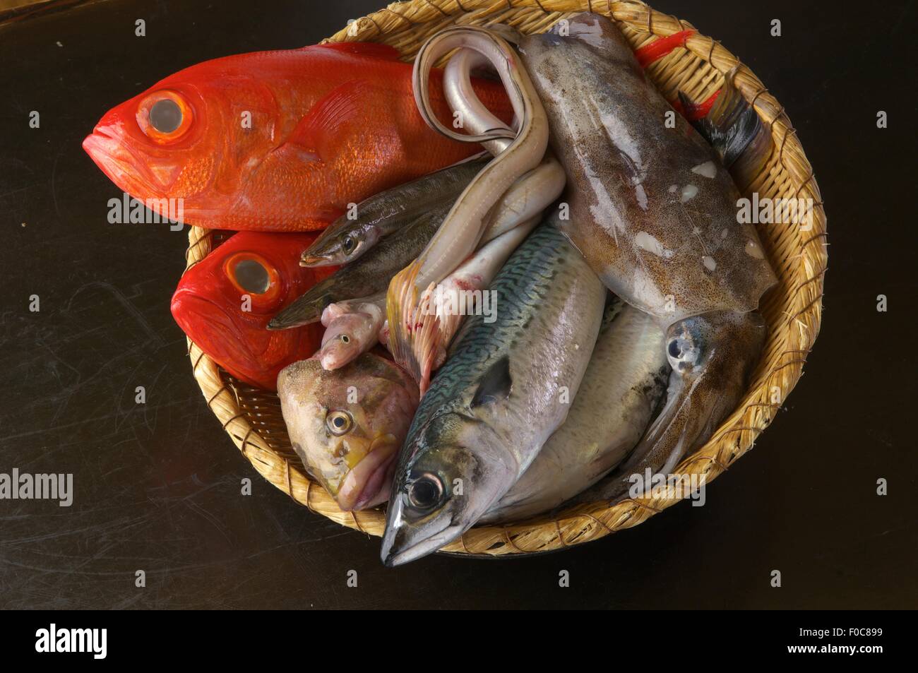 Selection of raw fresh fish in basket Stock Photo - Alamy