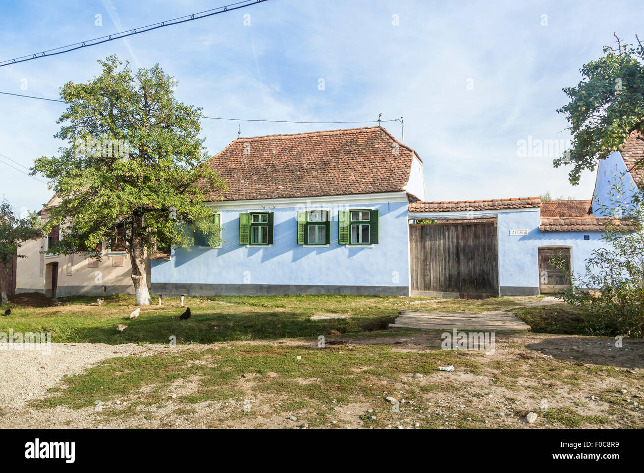 Prince Charles' charming holiday home, a blue house in the main street ...
