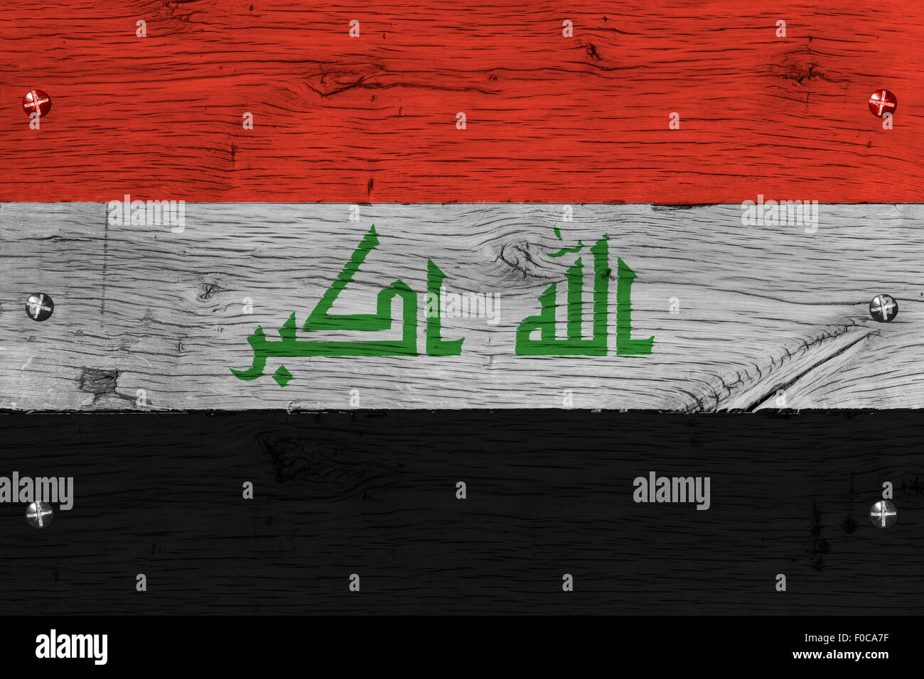 Iraq national flag. Painting is colorful on wood of old train carriage ...