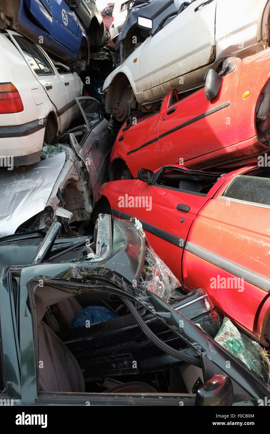 Full frame shot of cars stacked in scrap yard Stock Photo - Alamy