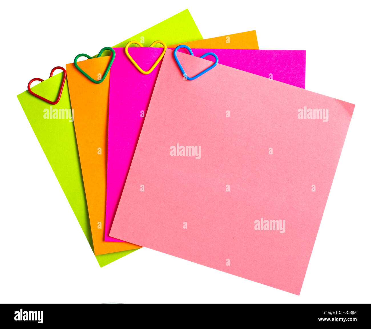 reminder paper and clip in the form of heart isolated on white ...