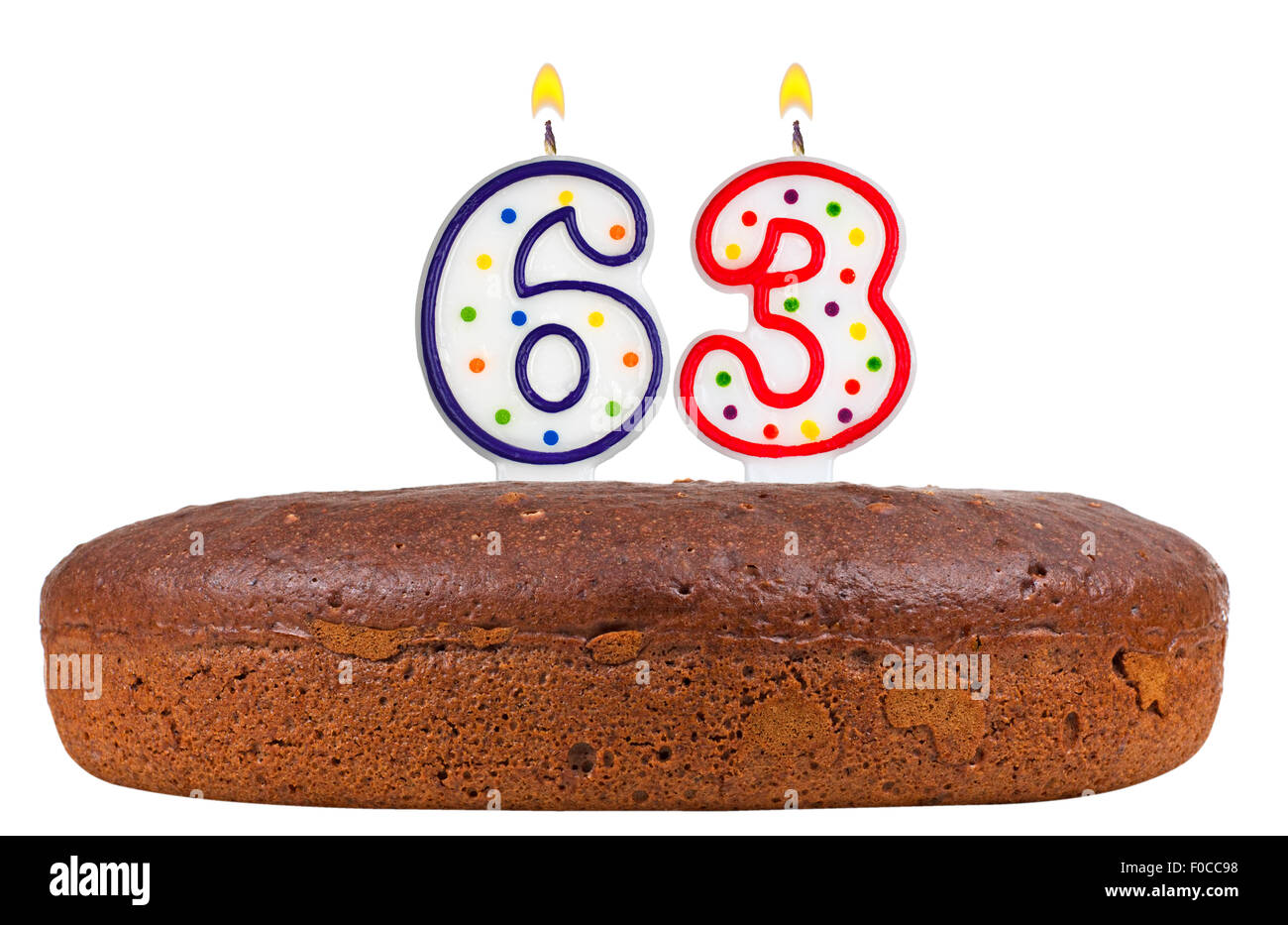 birthday cake with candles number sixty three isolated on white ...